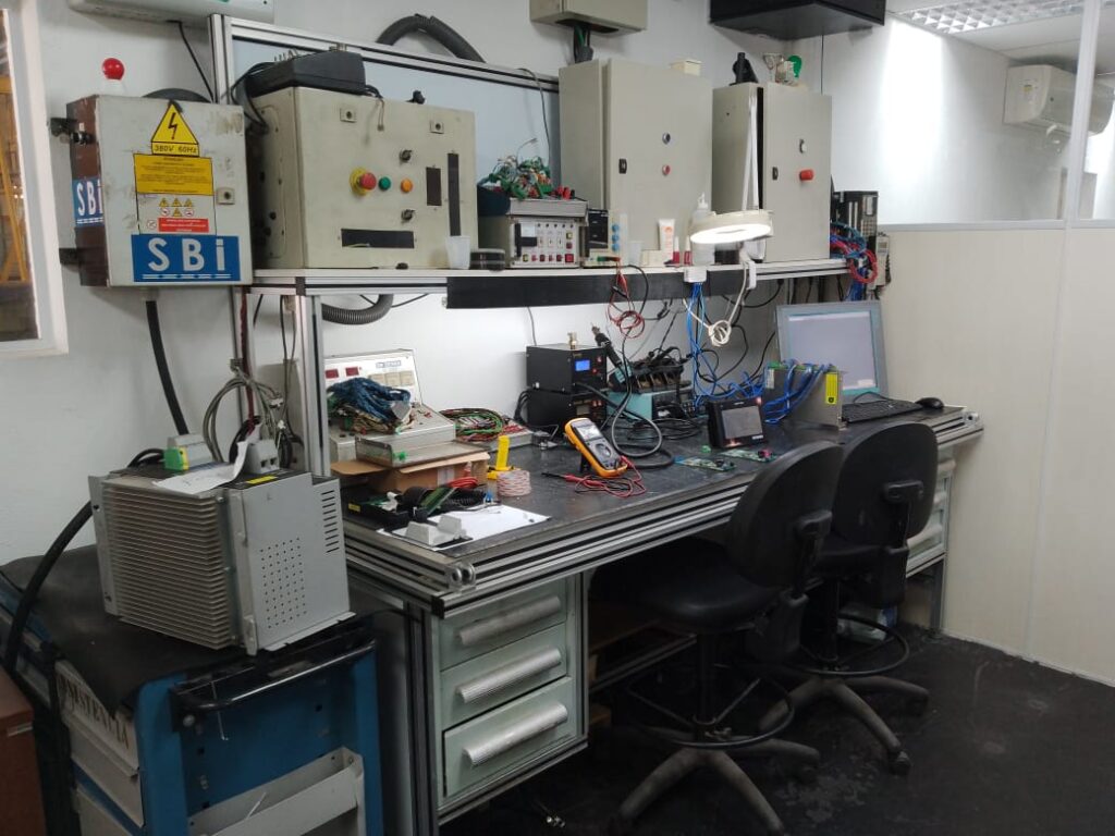 Laboratory for repairing welding controls, with technicians trained to ...